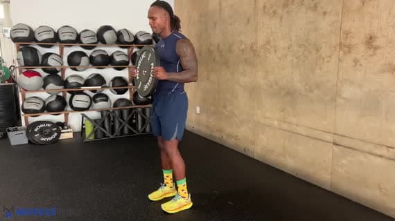 lunge and twist with dumbbell